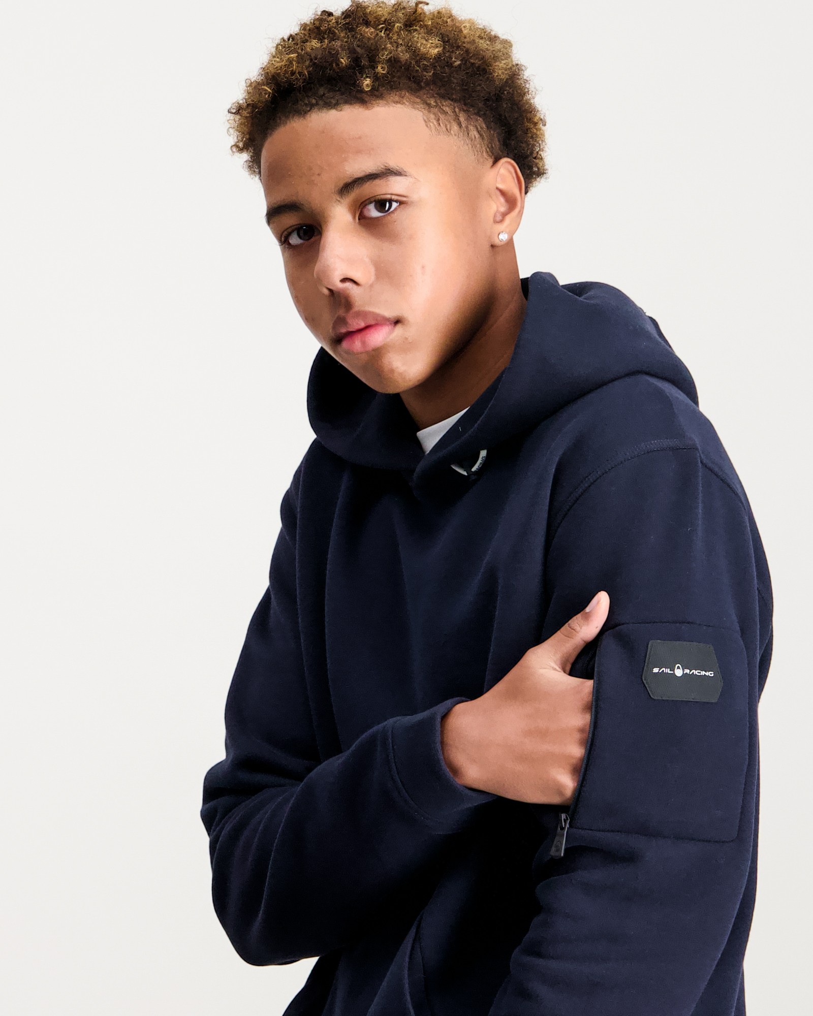 Sail Racing JR WAVE HOOD Blå för Kille | Kids Brand Store